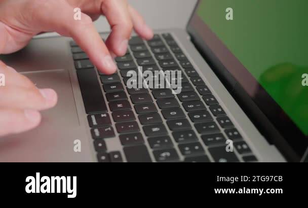 Person types text on laptop preparing article for profitable project ...