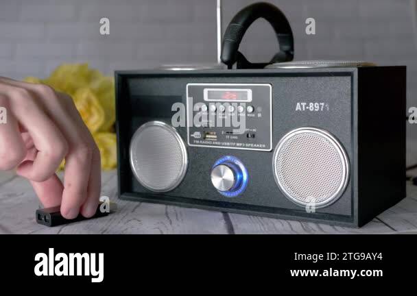 Female Hands Connecting a USB Flash Drive to the Connector of a Radio ...