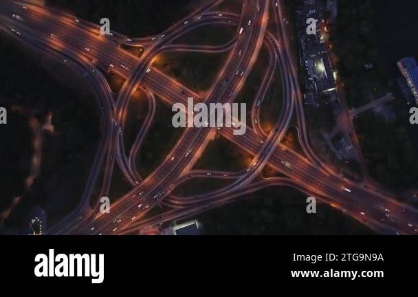 The Paton Bridge in Kyiv in the evening with lights and cars moving ...