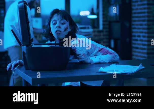 Stupid spooky looking monster trying to use printer machine at night ...