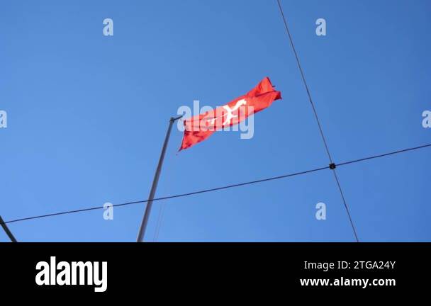 Pisan Cross on Flag flying on Leaning tower of Pisa. Coat of arms of ...