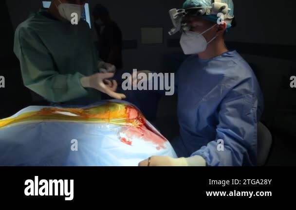 KYIV, UKRAINE - MAY 25, 2022: The neurosurgeon performs ventriculo ...