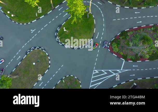 Karting Motion on asphalt road with white markings. Karting Attraction ...