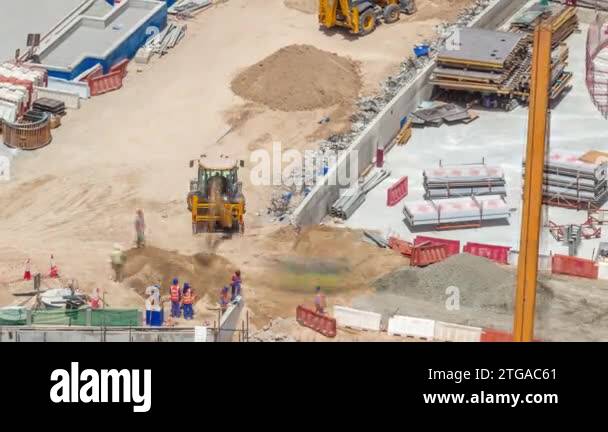 Excavators and bulldozers working at construction site of new ...