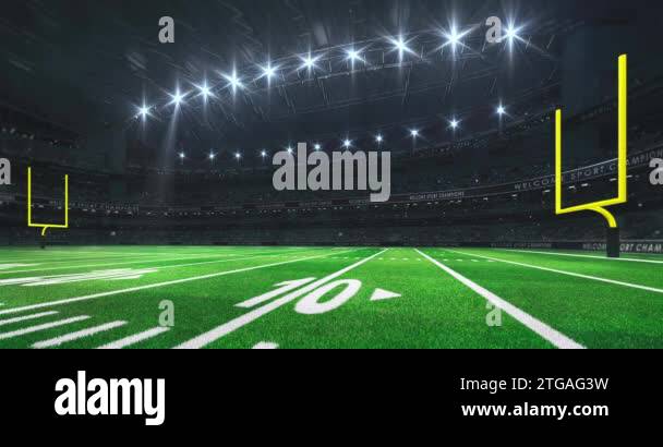 American football stadium with yellow goalposts, grass field and ...