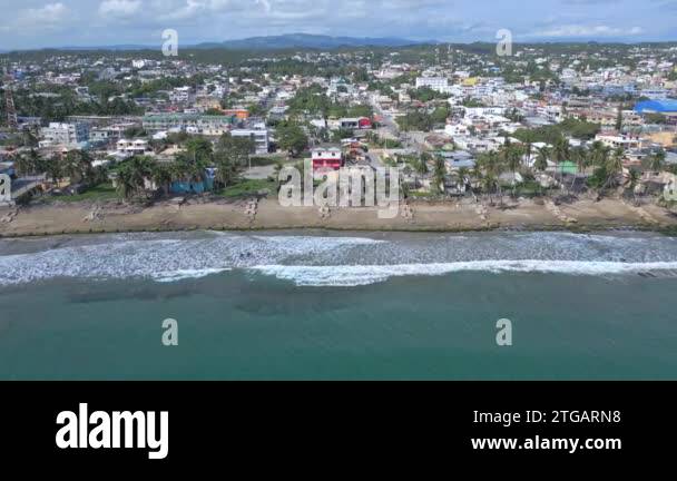 Ocean Waves Crashing On Malecon de Nagua Along The Seaside Village In ...