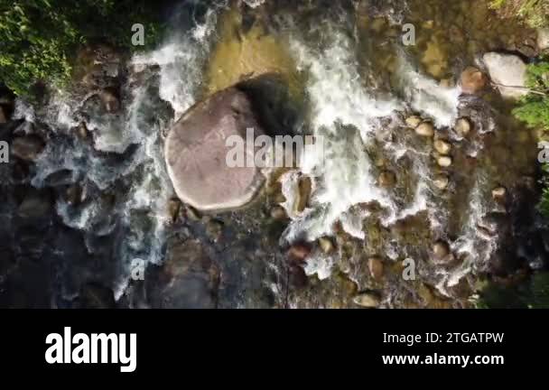 Water stream flow over the rock at Sungai Sedim recreational forest ...