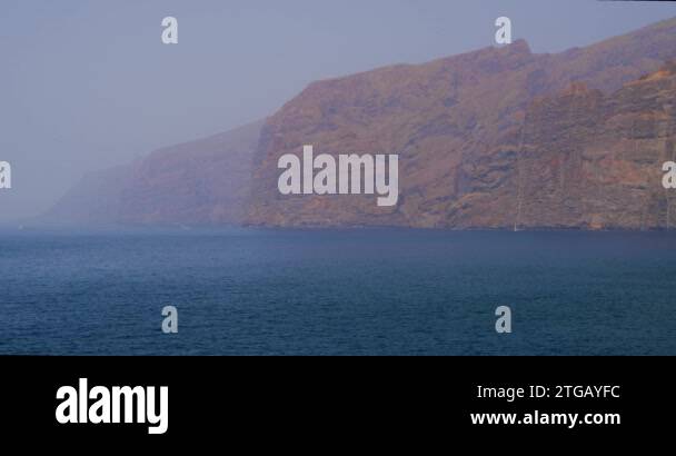 Sandstorm Calima in Tenerife Los Gigantes cliffs. Canary Islands hit by ...