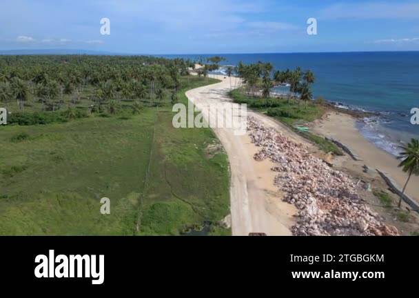Heavy Equipment Driving At Malecon de Nagua Under Construction In ...