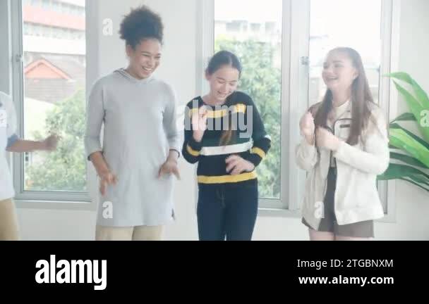 Group of student doing activity to teacher with dancing and movement ...