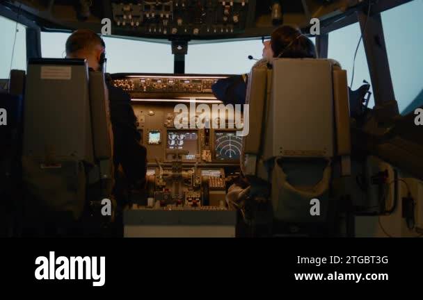 Captain And Copilot Inserting Destination Coordinates And Fixing Altitude And Longitude Level On