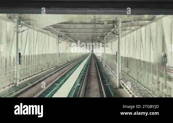 Subway train running in Chongqing city with urban architecture in China ...