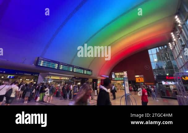 The main train station in Cologne Germany is lit up in rainbow colours ...