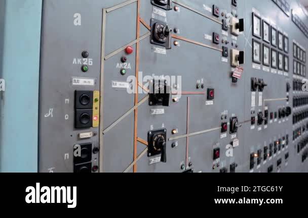 Control panel at a power station. Buttons, switches and devices for ...