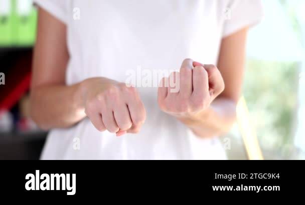 Woman slowly raises middle finger as sign of resentment and contempt ...