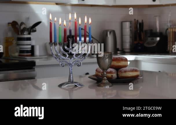 Jewish holiday symbol Hanukkah brightly glowing on Hanukkiah Menorah ...