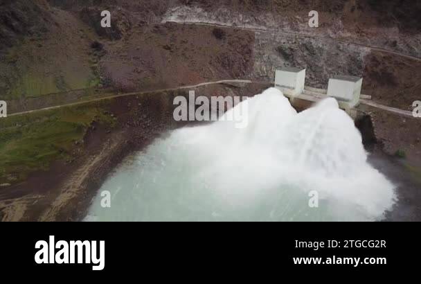 Dam with large discharge pressure of the water. Water dam. Shooting ...