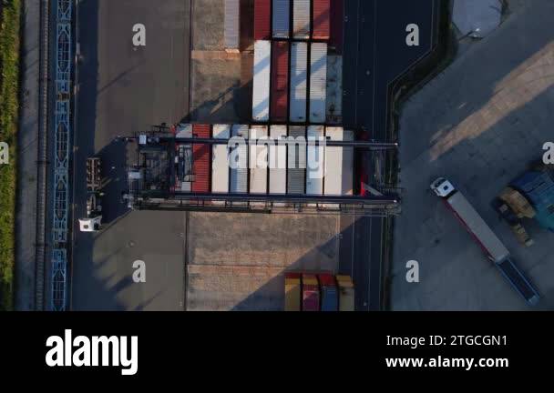 Shipping container site in warehouse storage factory, aerial view ...
