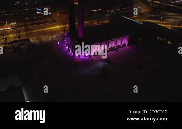 Tilt up chimneys of Kattilahalli former power plant, lit pink at night ...