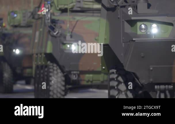 The Slow motion armored military vehicles parade soldiers on top ...