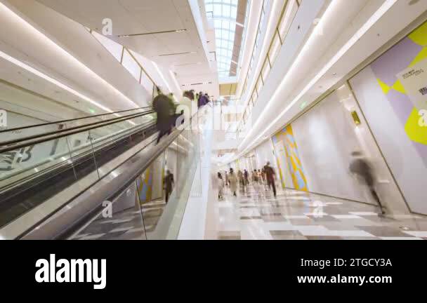Shoppers in shopping mall, showing the modern interior design, with ...