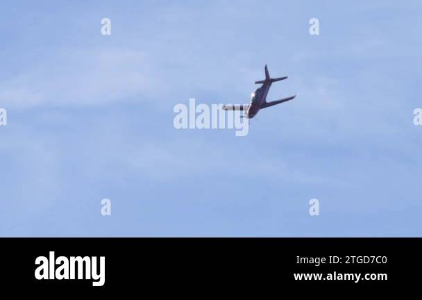 Red, fast, aerodynamic, oder turboprop airplane high speed flyby in an ...