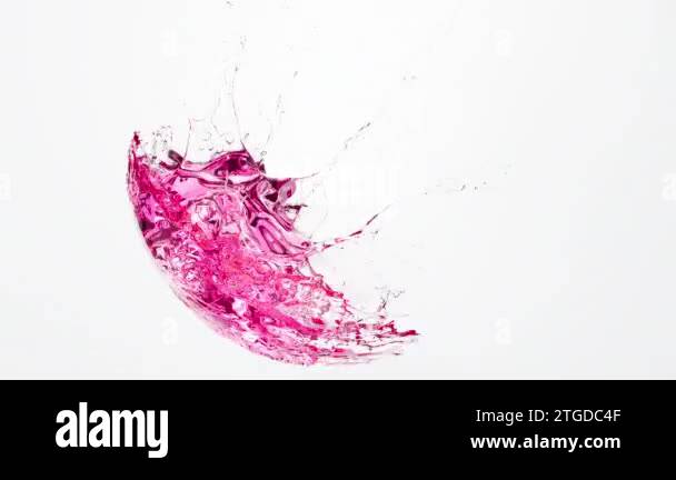 Pink liquid splash on white background isolated 3D render, spheric ...
