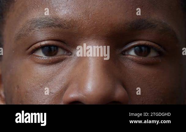 Macro Shot Of Young Adult Blinking In Front Of Camera Showing Eyes