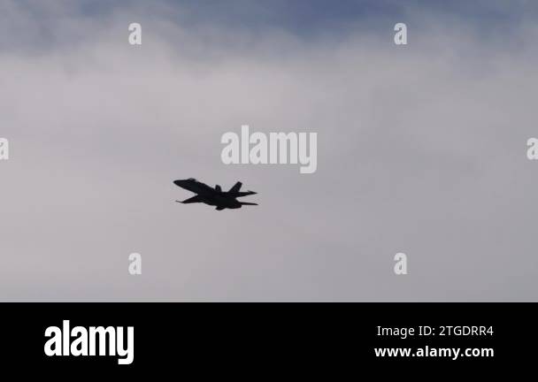 Top gun pilot practices firing the cannon of his supersonic fighter jet ...