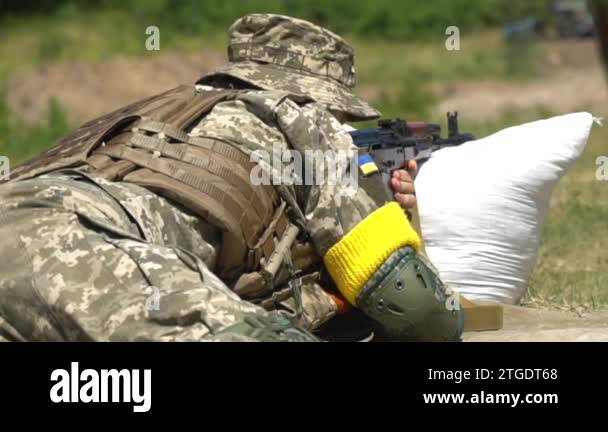 Ukrainian military shoots from a machine gun kalashnikov, ak-47 machine ...