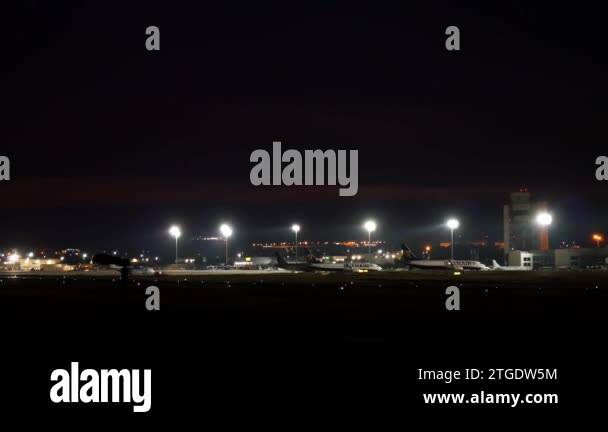 Jet2 Aircraft taking off at night with Raynair planes parked in the ...
