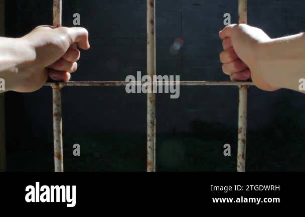 Prisoner bars Stock Videos & Footage - HD and 4K Video Clips - Alamy