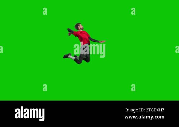 Male volleyball player bouncing and hitting virtual ball with his hand ...