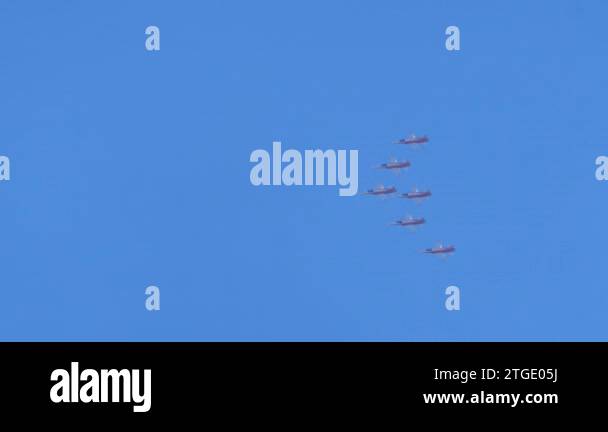Fast military airplanes in red and white colour of Swiss flag in flight ...