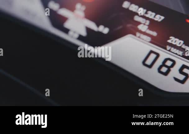 Illuminated dashboard speedometer of super sports car, counting ...