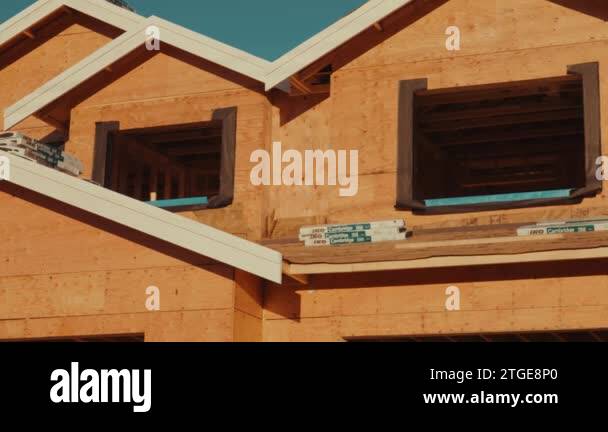 The second story of a plywood house building under construction Stock ...