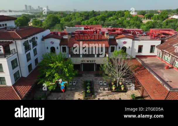 Fort Worth Skyline. Aerial from famous Stockyards. Texas flags wave in ...