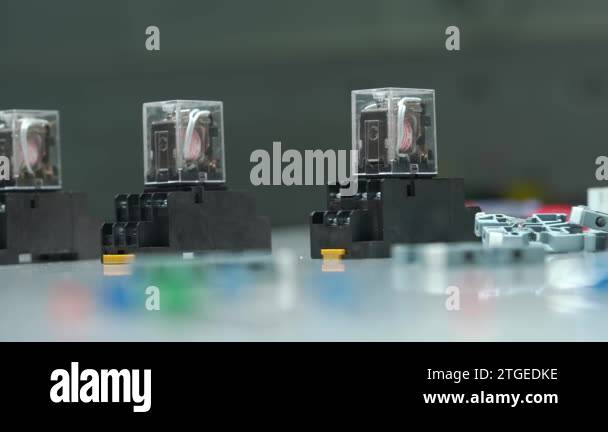 Relay with electromagnetic coils of direct and alternating current on ...