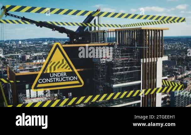 Orbit shot around top of apartment building in metropolis. Scaffolding ...