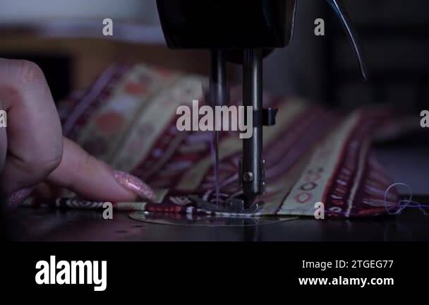 Vintage sewing machine needle in motion. Close-up of a sewing machine ...