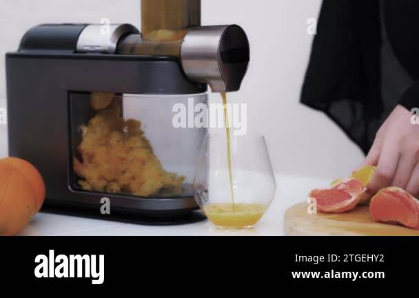 Orange juice squeezing machine Stock Videos & Footage - HD and 4K Video ...