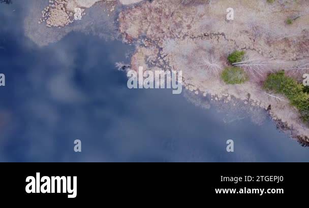 Top down view of a island and a lake texture. River going into the lake ...