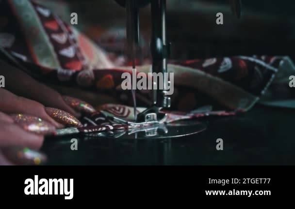 Vintage sewing machine needle in motion slow mo. Close-up of a sewing ...