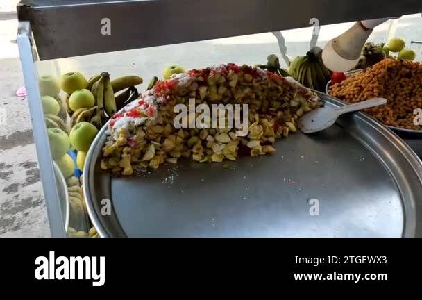 Fruit chaat stall showing multiple sliced fruits 4k high resolution ...