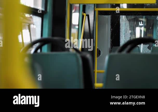 Broken window glass of a trolleybus or bus after an accident. View from ...