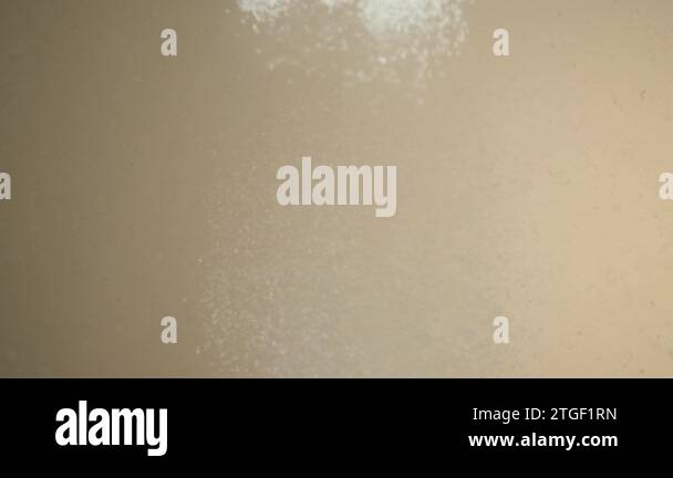 salt, grains of salt falling into water, slow motion Stock Video ...