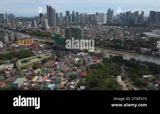 An aerial of crowded residential buildings in the center near Pasig ...