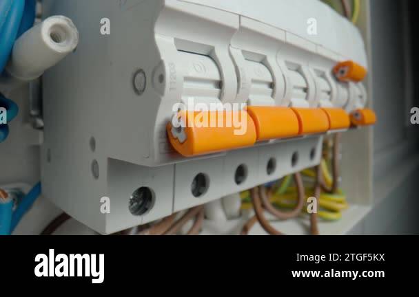 White electrical panel with many wires, electrical parts, automatic ...