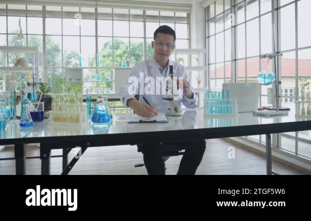 Research concept of 4k resolution. Asian scientists are examining the ...