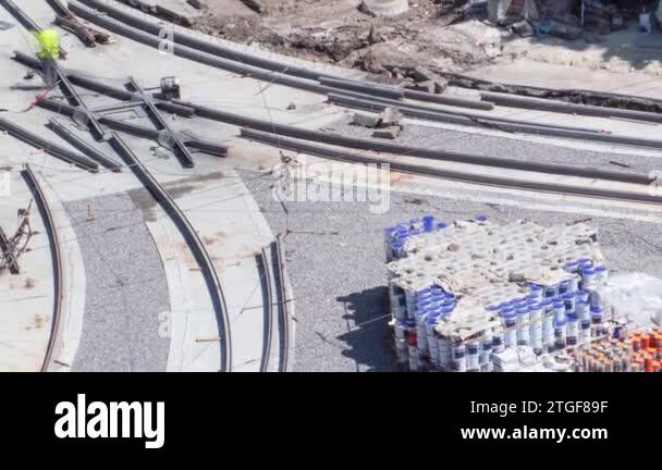 Repair works on the street timelapse. Laying of new tram rails on a ...